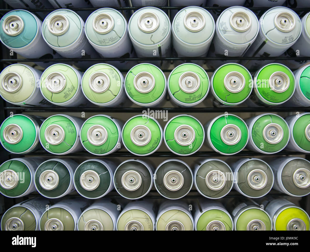 colorful cans of paint stand rows on a shelf Stock Photo - Alamy