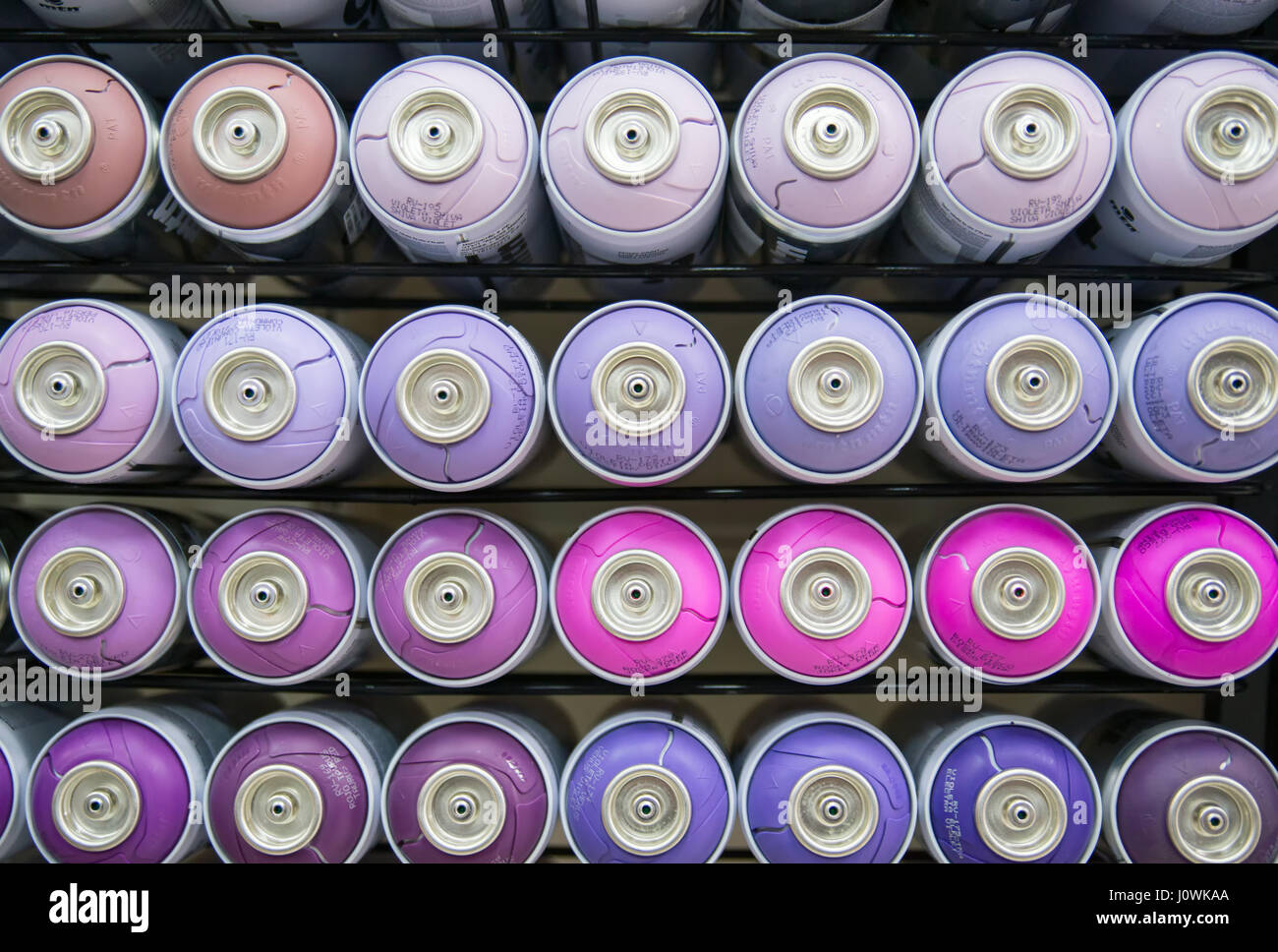 colorful cans of paint stand rows on a shelf Stock Photo - Alamy
