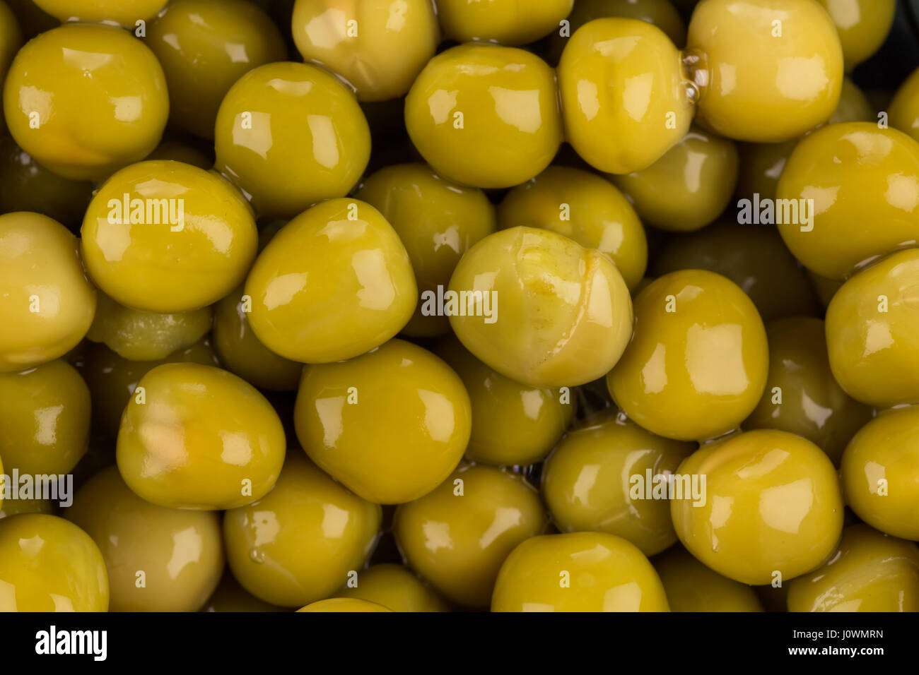Marinated green peas close up shot for background Stock Photo - Alamy