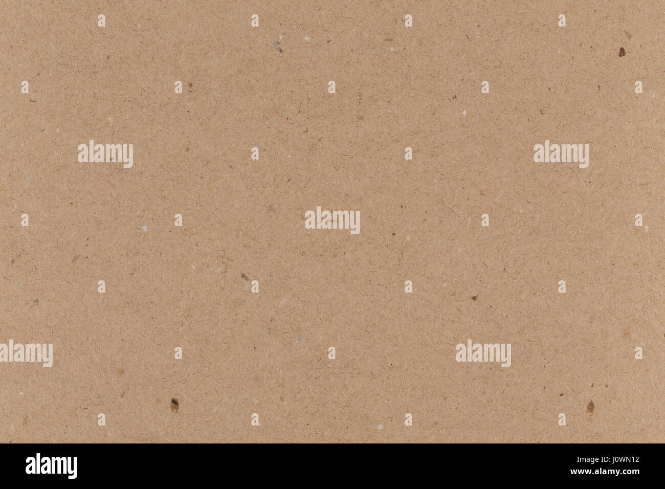 Dense cardboard paper closeup texture or background Stock Photo - Alamy