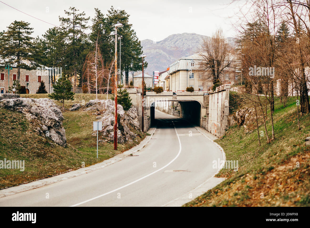 Tunnel on the road. Two-layer coating. Continuous lane on the road ...