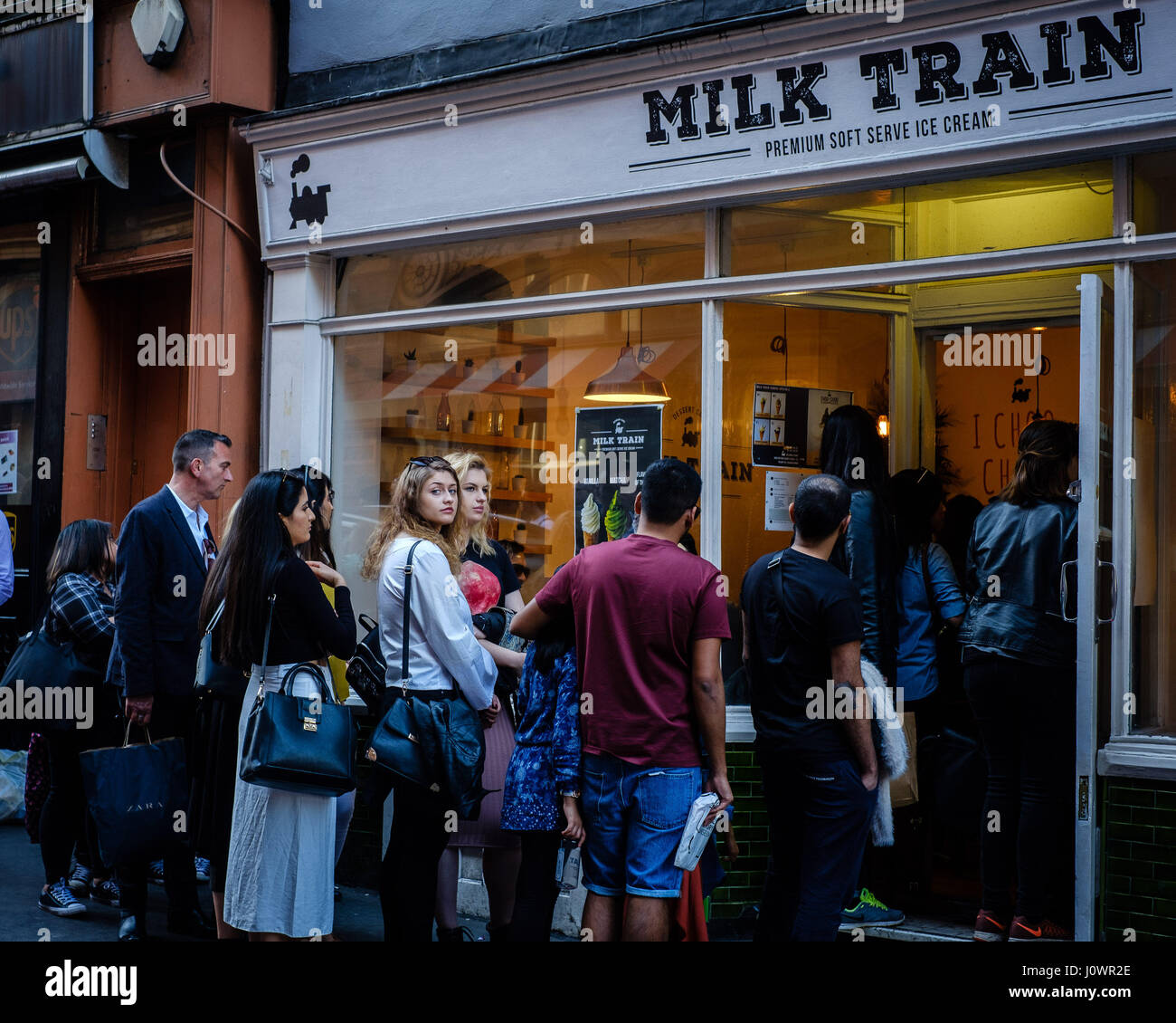 On a hot afternoon, a long queue forms outside a trendy Ice Cream ...