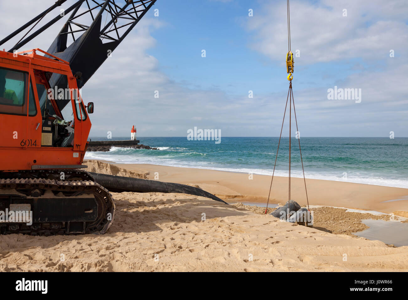 Hydraulic transfer system of sand, at Capbreton (Landes - France). With ...