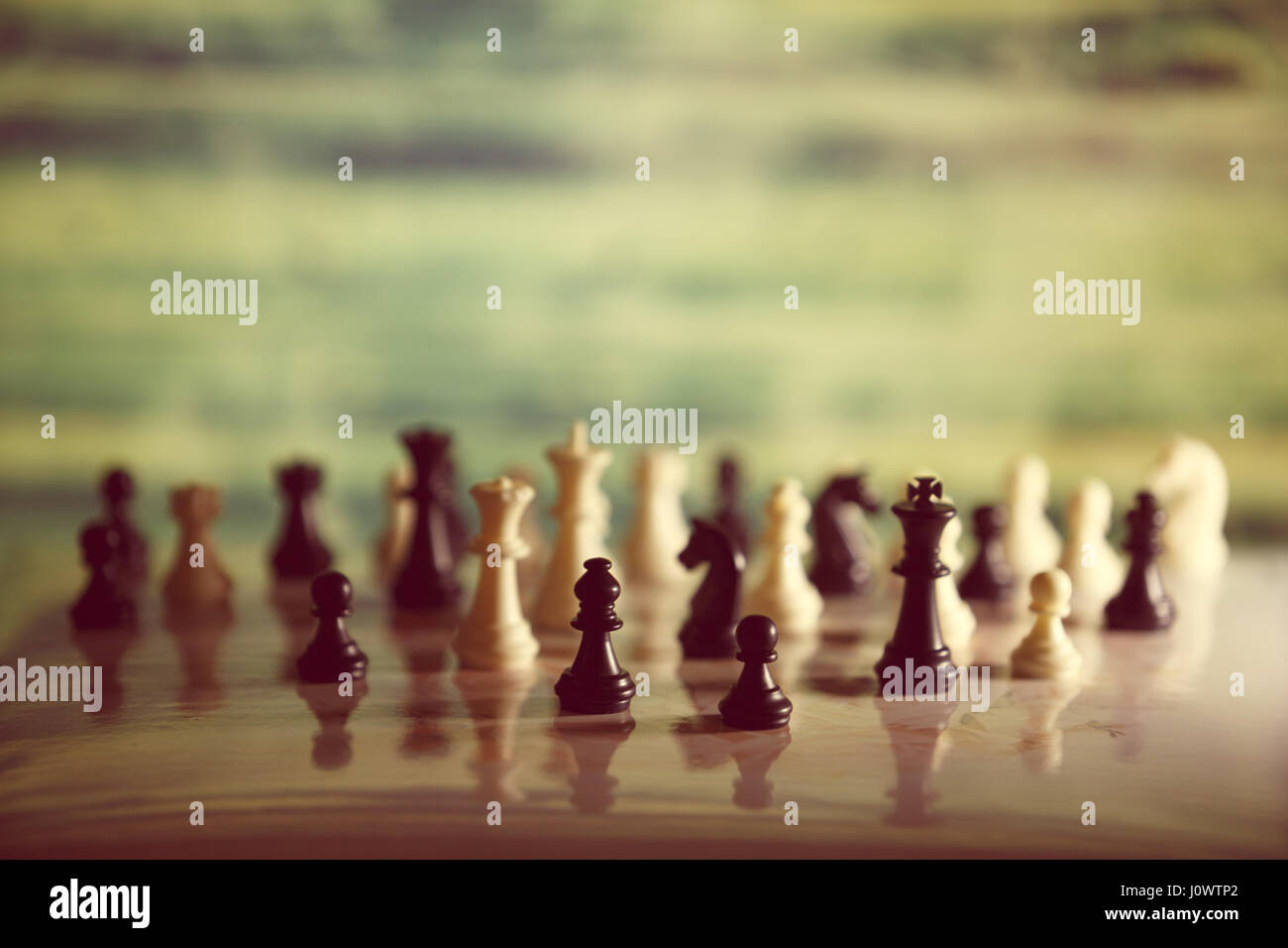 Chess strategy concept is on the wooden background. Abstract background ...