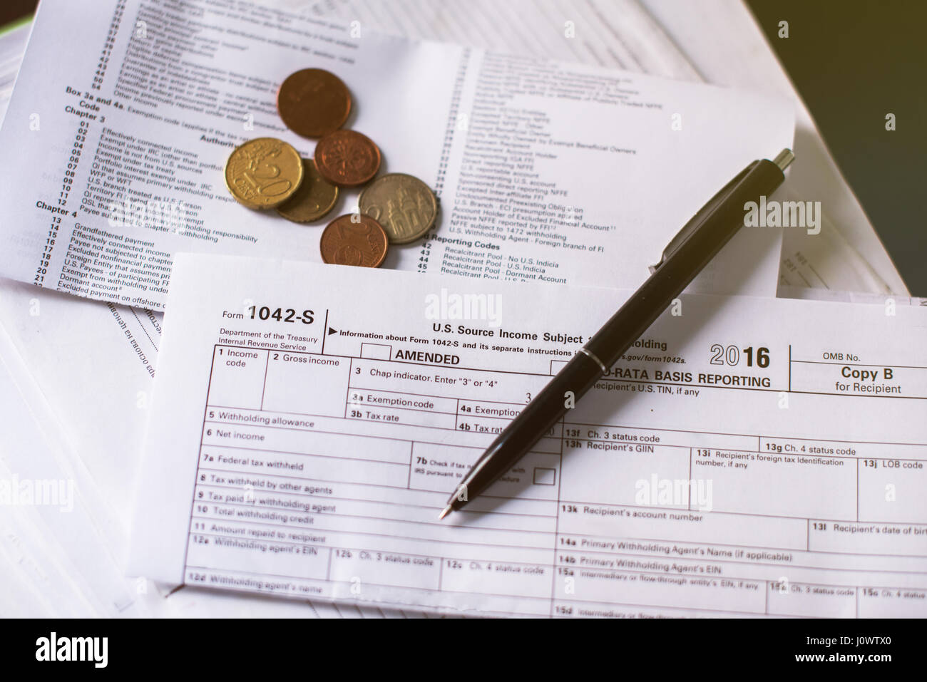 Tax Time Concept! Clock and Taxes Due reminder Stock Photo - Alamy