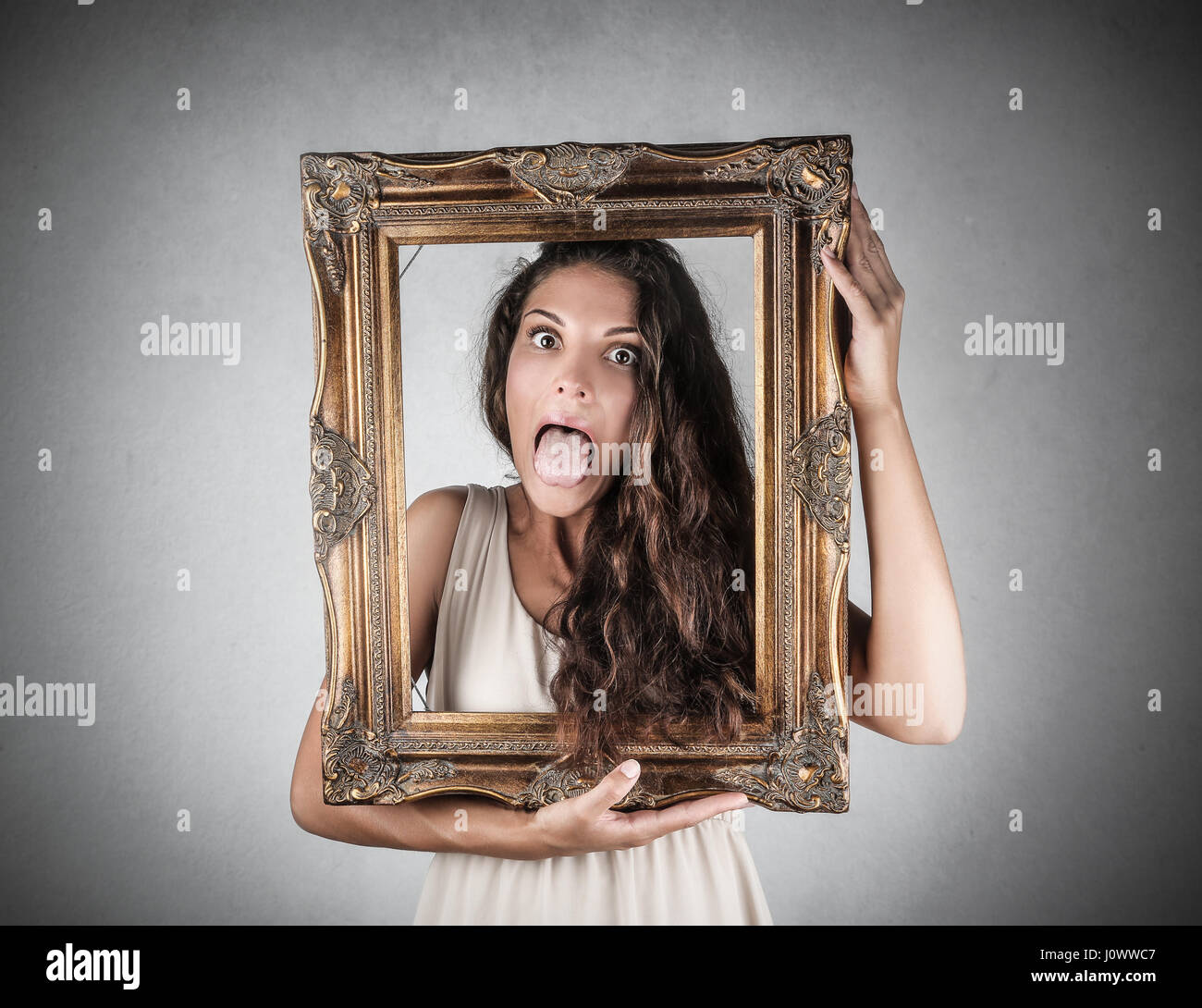 Woman in the frame hi-res stock photography and images - Alamy
