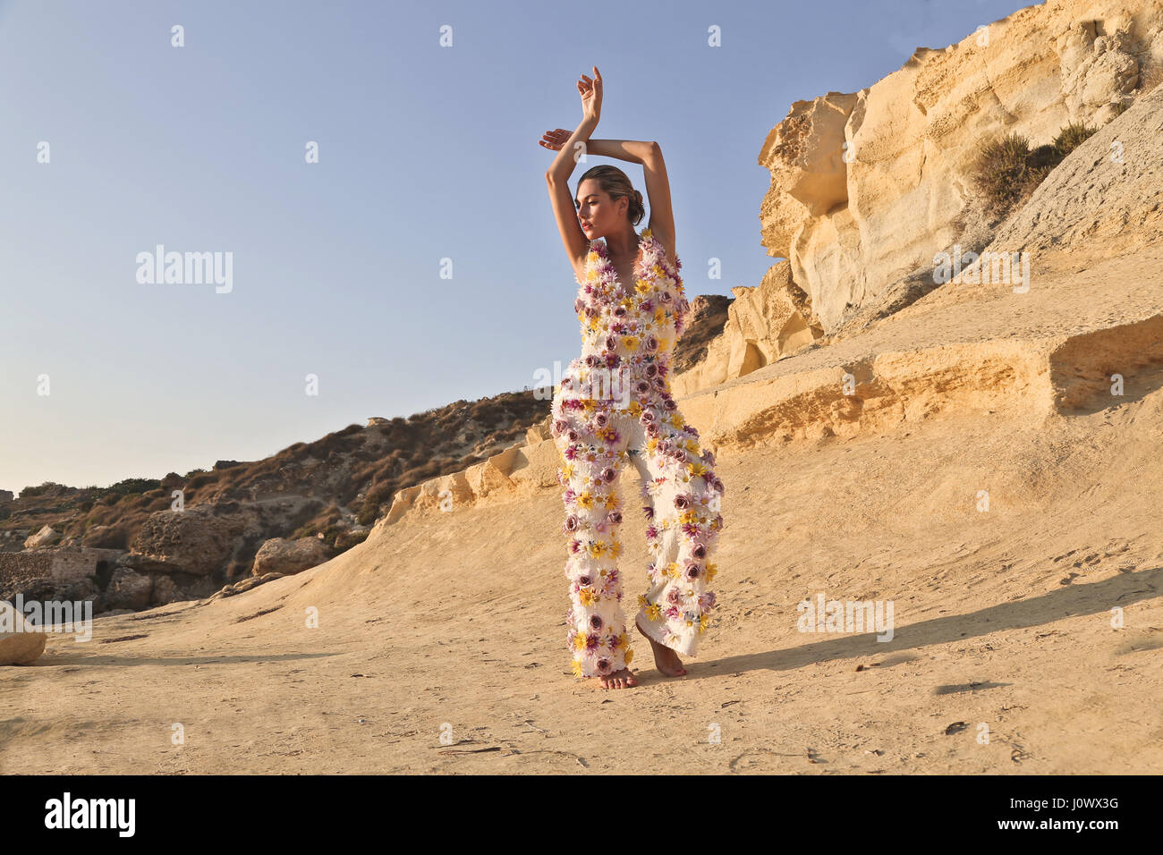Woman posing in landscape Stock Photo - Alamy