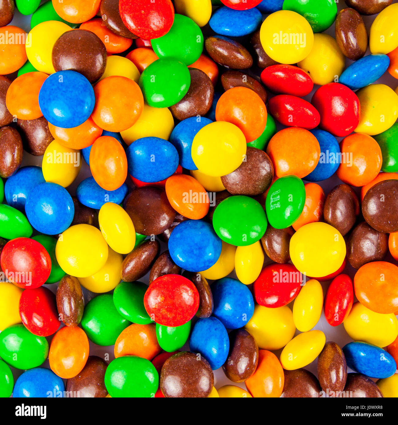 Candy background. Multi colored candy Stock Photo - Alamy