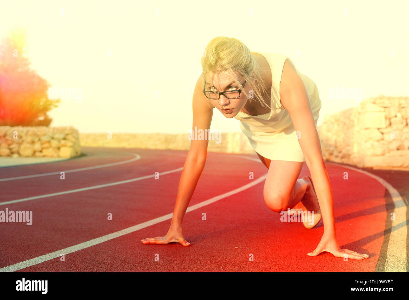 Stylish woman at start lane Stock Photo - Alamy