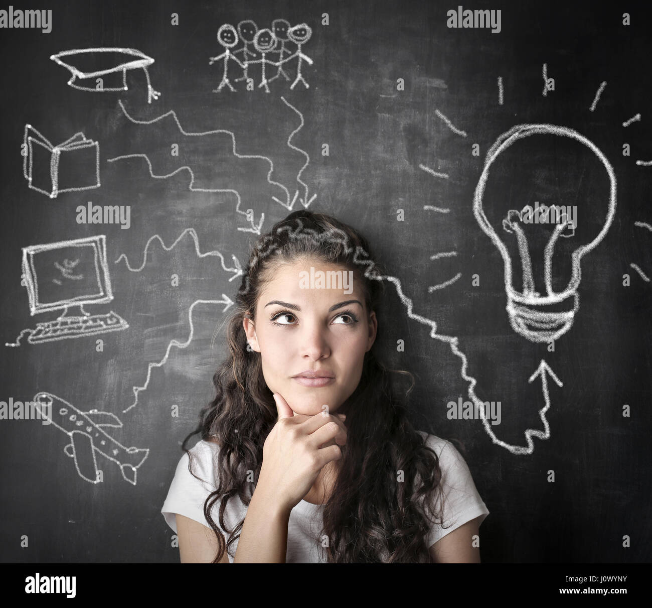 Brunette woman having an idea Stock Photo - Alamy Brunette woman having an idea Stock Photo - Alamy