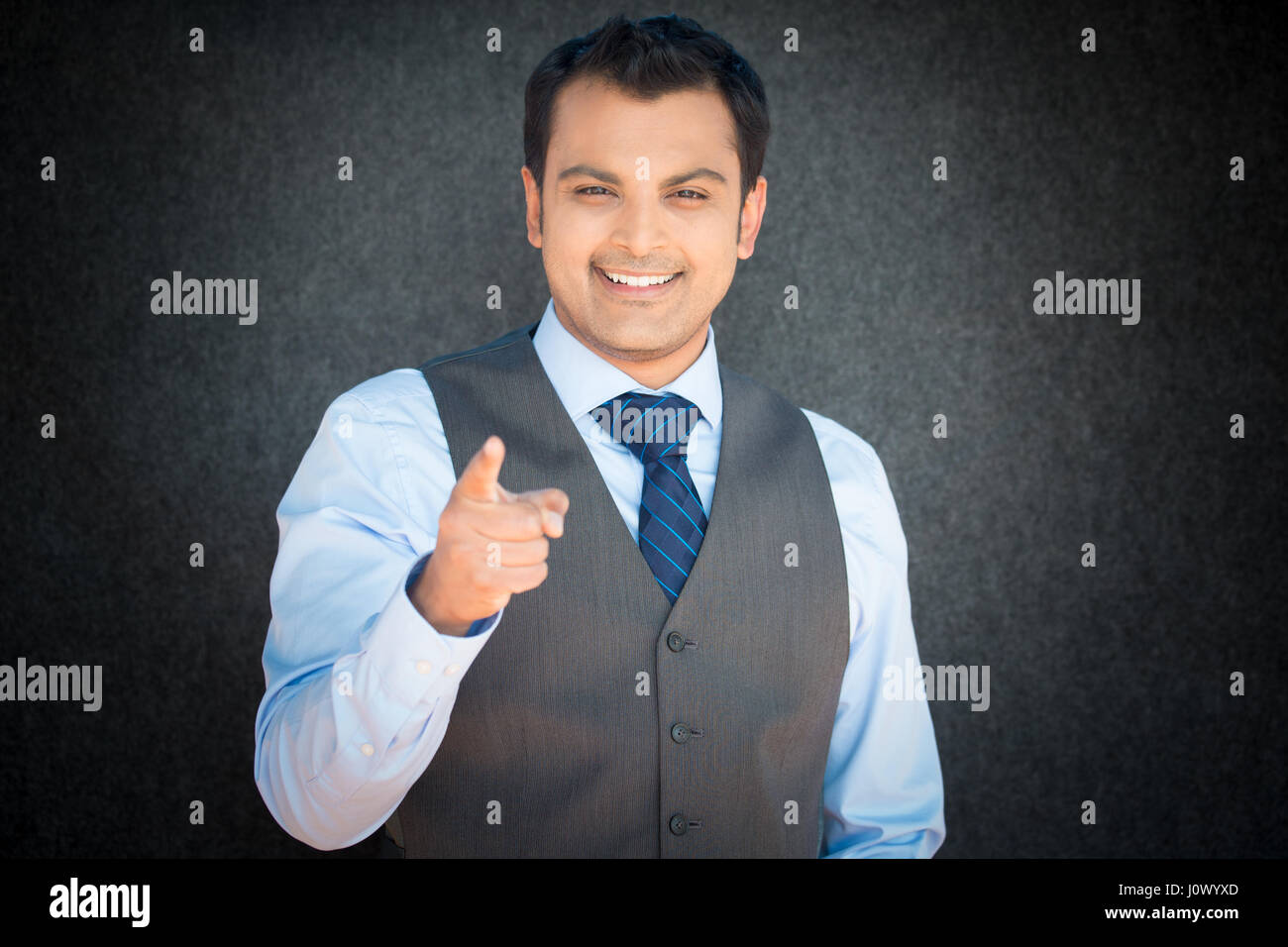 Closeup portrait, smiling handsome, excited, happy man pointing at you ...