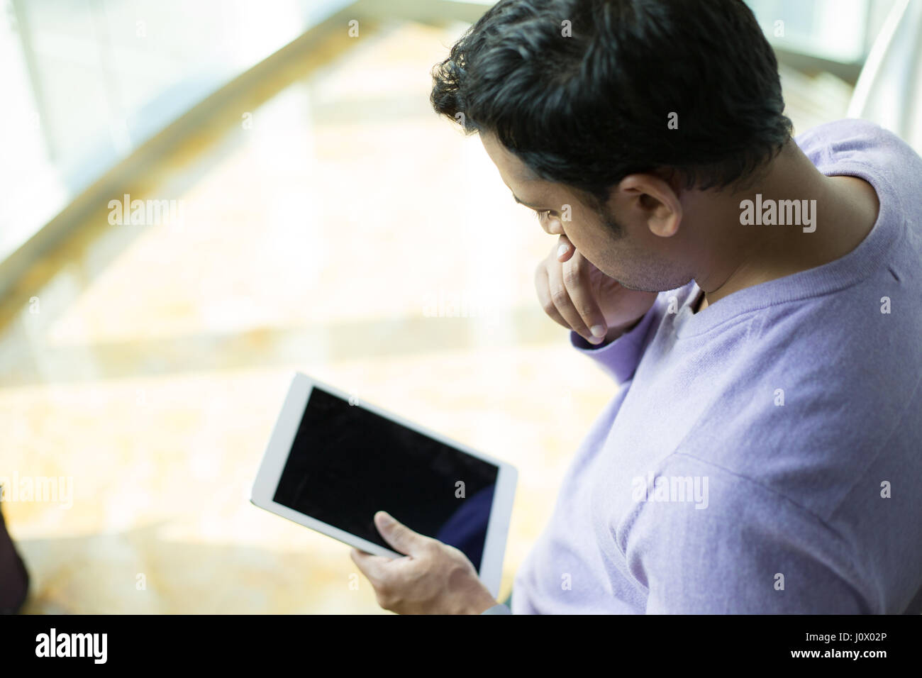 Tablet perusing hi-res stock photography and images - Alamy