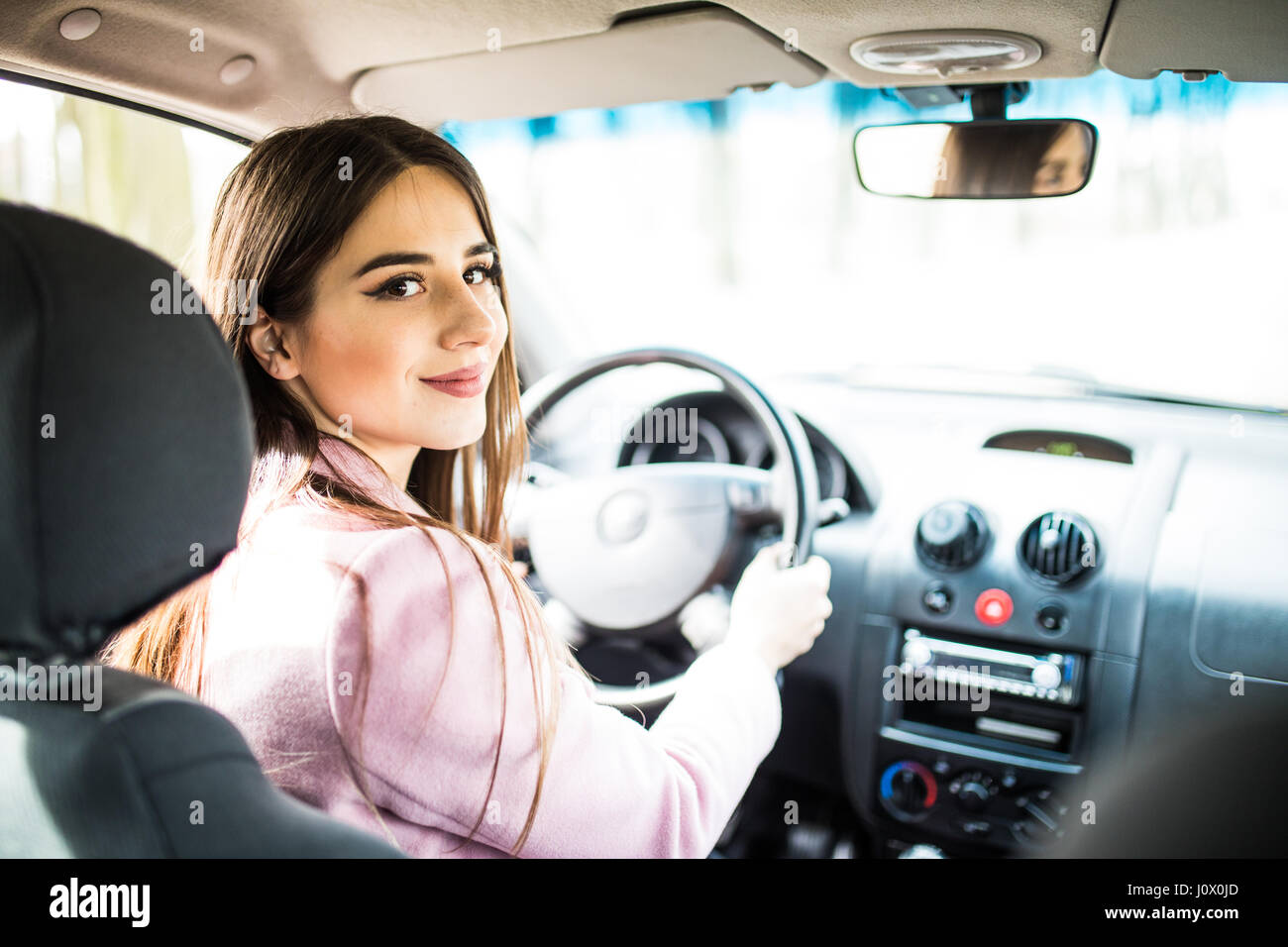 Woman turning around car hi-res stock photography and images - Alamy