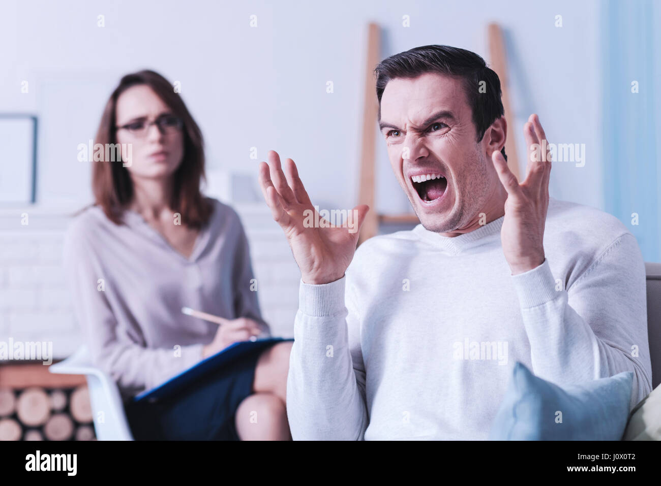Angry furious man crying Stock Photo - Alamy