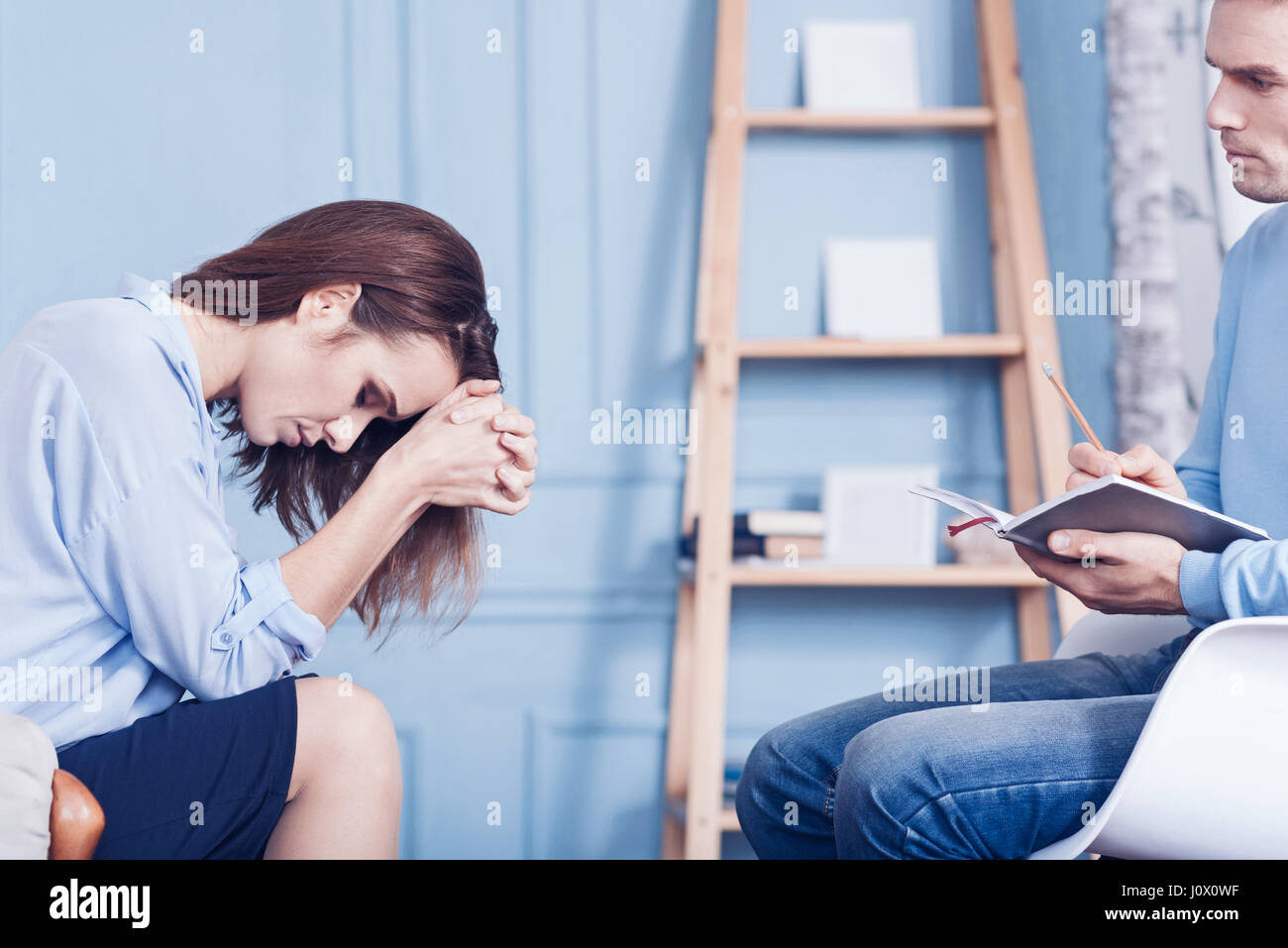 Unhappy depressed woman feeling desperate Stock Photo - Alamy