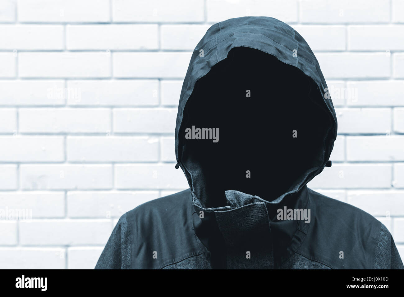 Protected witness identity concept with faceless hooded person Stock ...