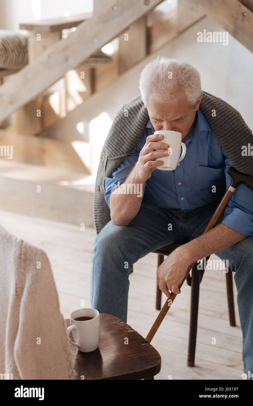 Sad desperate man imagining his wife Stock Photo - Alamy