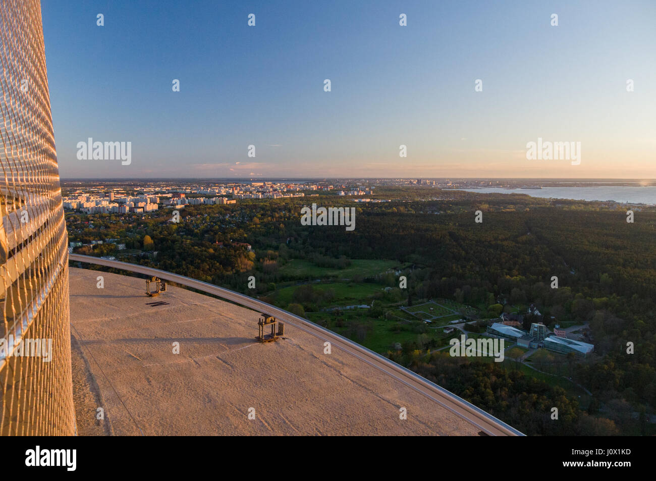 Sunset over Tallinn city, view from observation platform of TV tower ...
