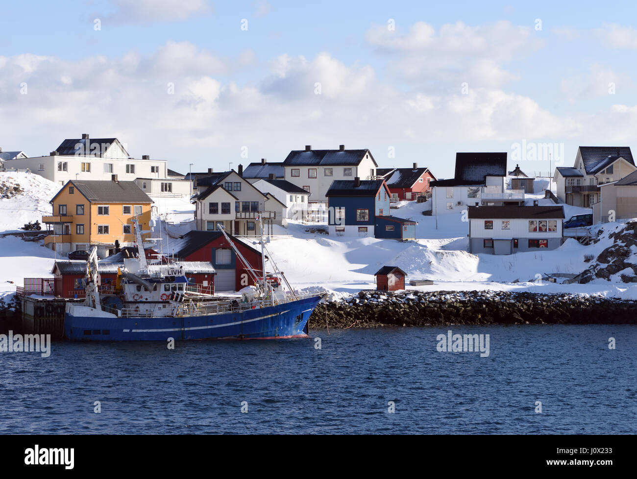 A fishing boat moored on the quay at Honningsvag, the northernmost city ...