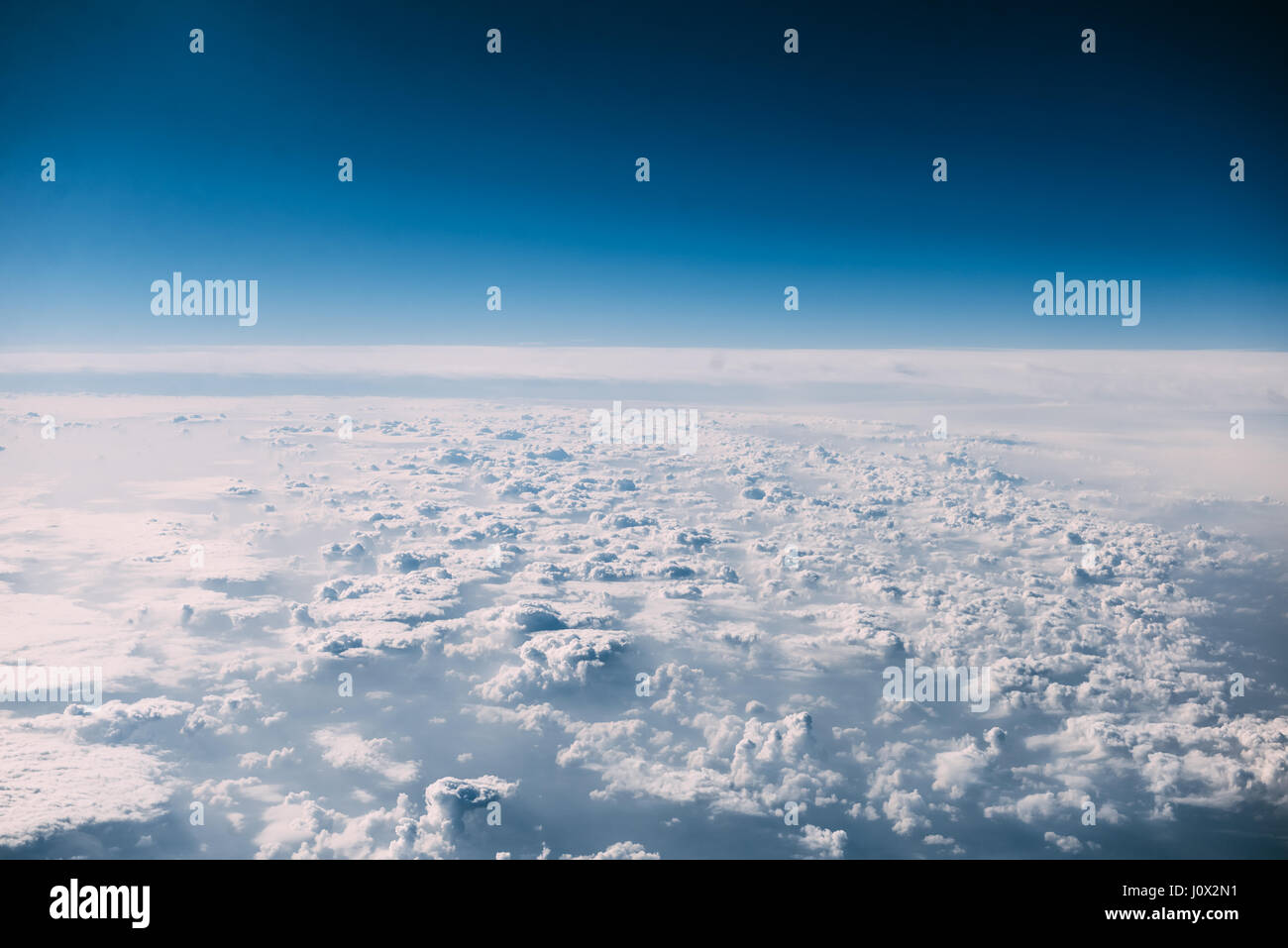 Blue sky above clouds Stock Photo - Alamy