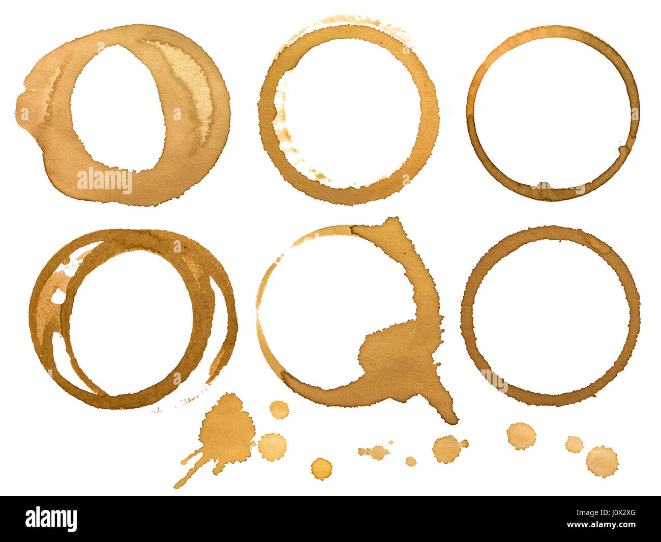 Photo of six coffee stains on white background Stock Photo - Alamy