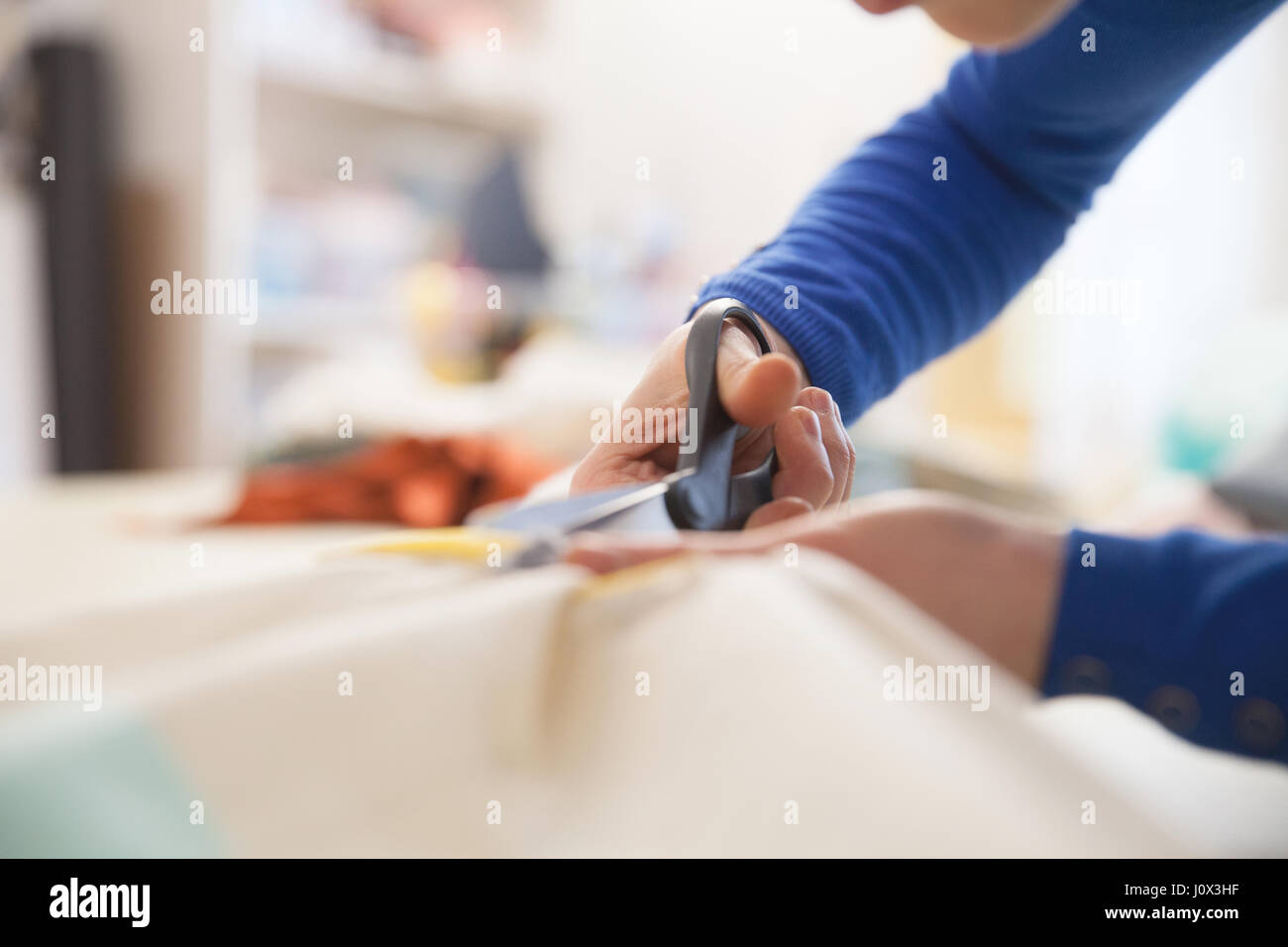 Young woman tailoring in her own small business crafting atelier Stock ...