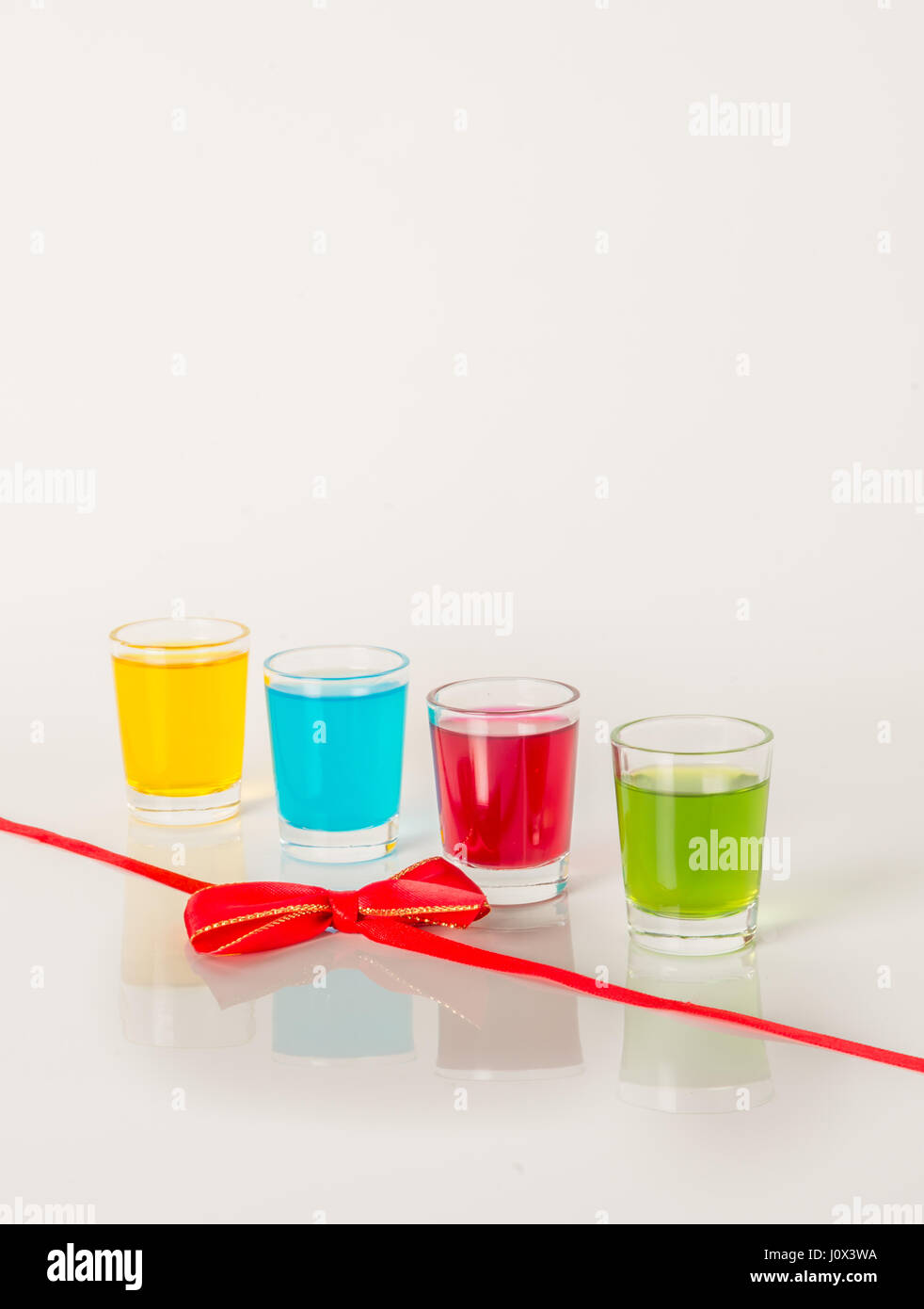 Colorful set of drinks, color drink decorated with fruit, color shots ...