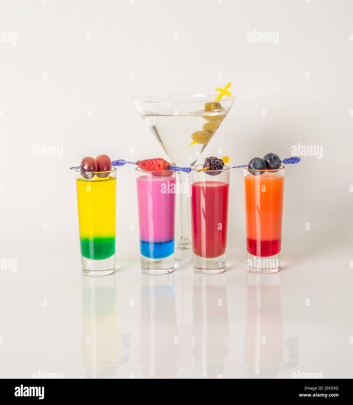 Colorful set of drinks, color drink decorated with fruit, color shots ...