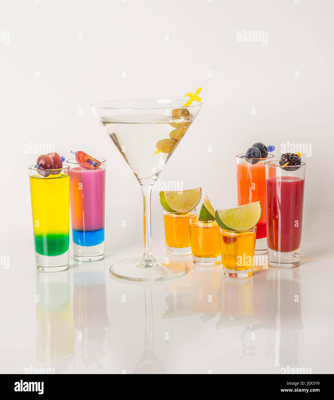 Colorful set of drinks, color drink decorated with fruit, color shots ...