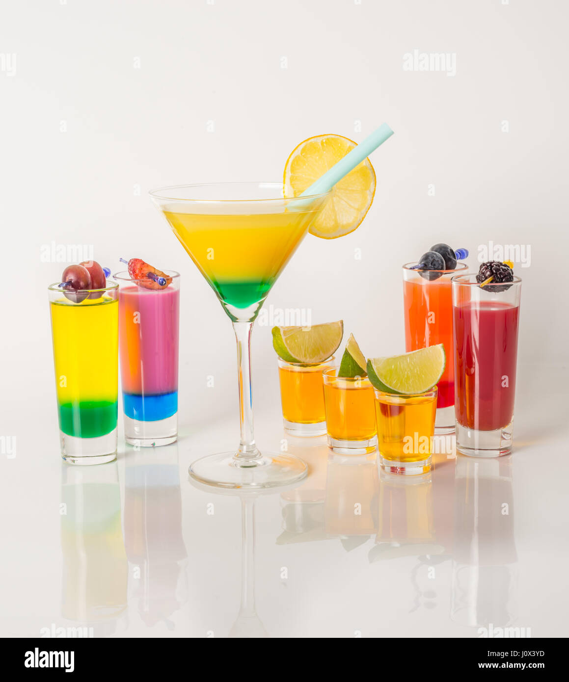 Colorful set of drinks, color drink decorated with fruit, color shots ...