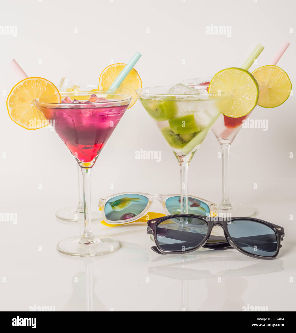Colorful set of drinks, color drink decorated with fruit, color shots ...