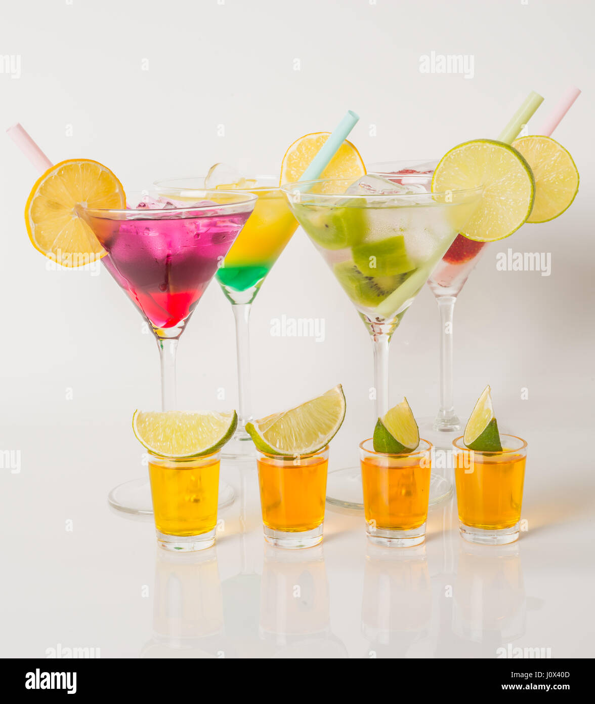 Colorful set of drinks, color drink decorated with fruit, color shots ...