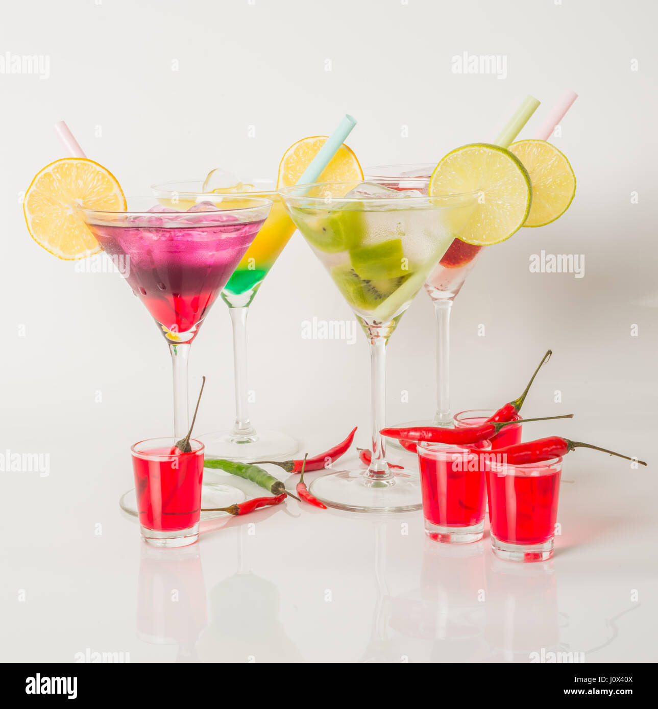 Colorful set of drinks, color drink decorated with fruit, color shots ...
