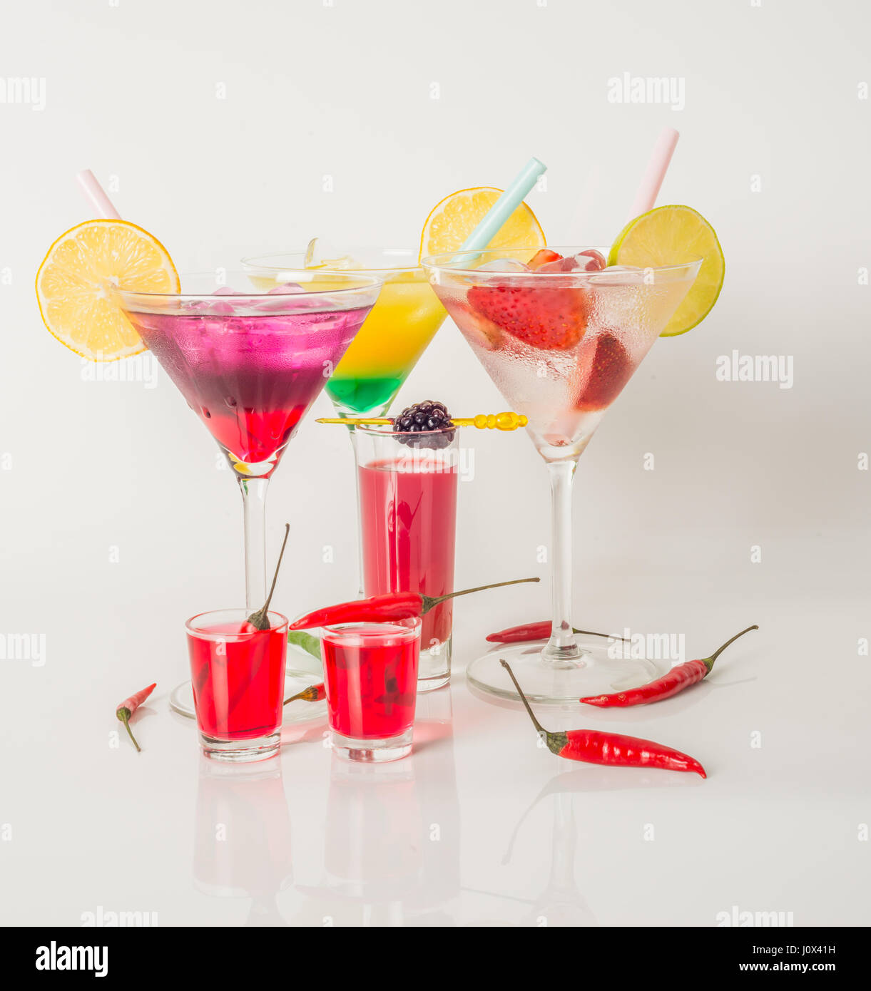 Colorful set of drinks, color drink decorated with fruit, color shots ...