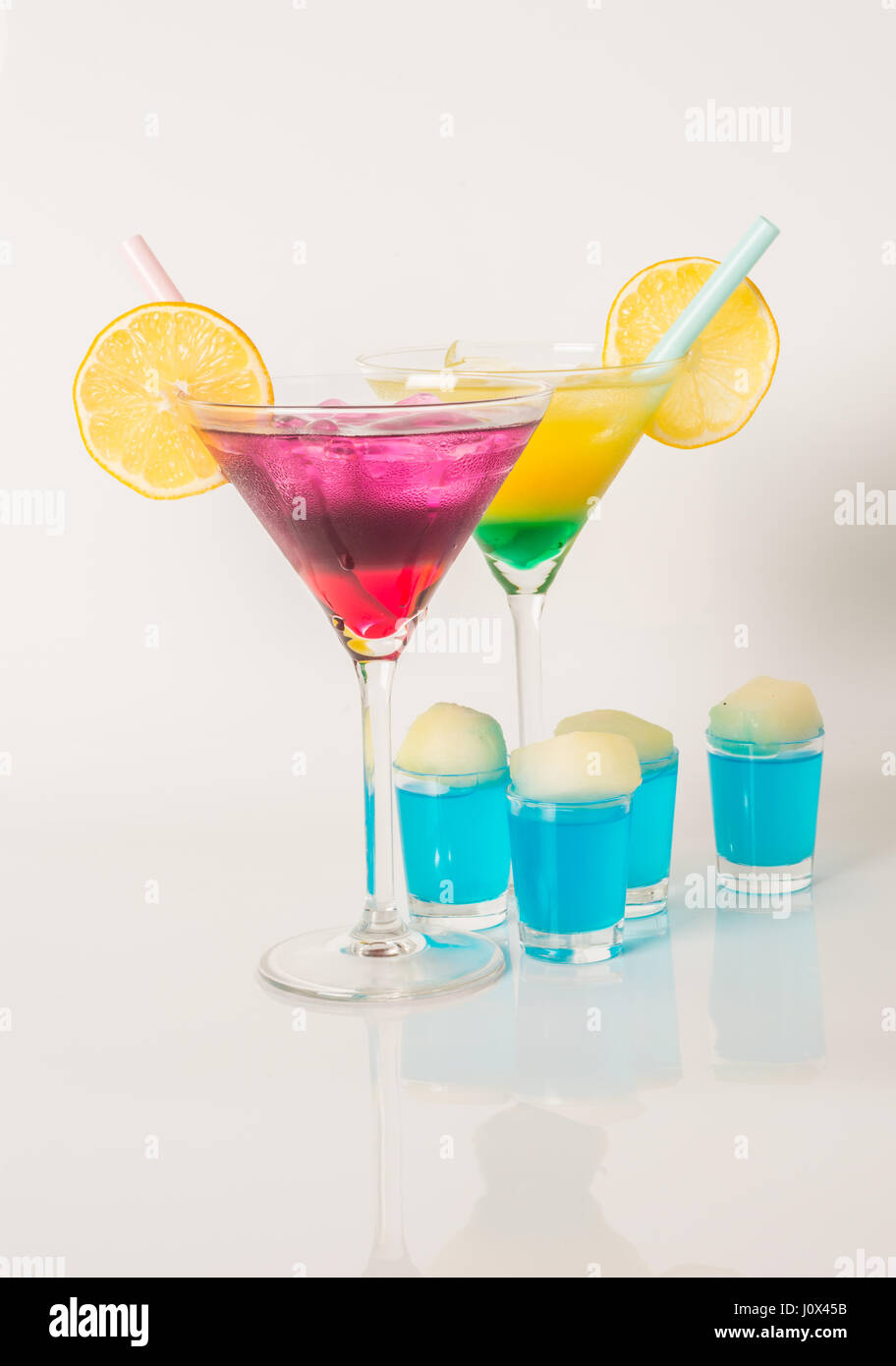 Colorful set of drinks, color drink decorated with fruit, color shots ...