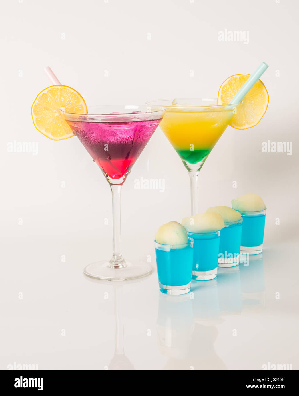 Colorful set of drinks, color drink decorated with fruit, color shots ...
