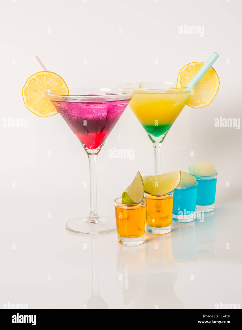 Colorful set of drinks, color drink decorated with fruit, color shots ...