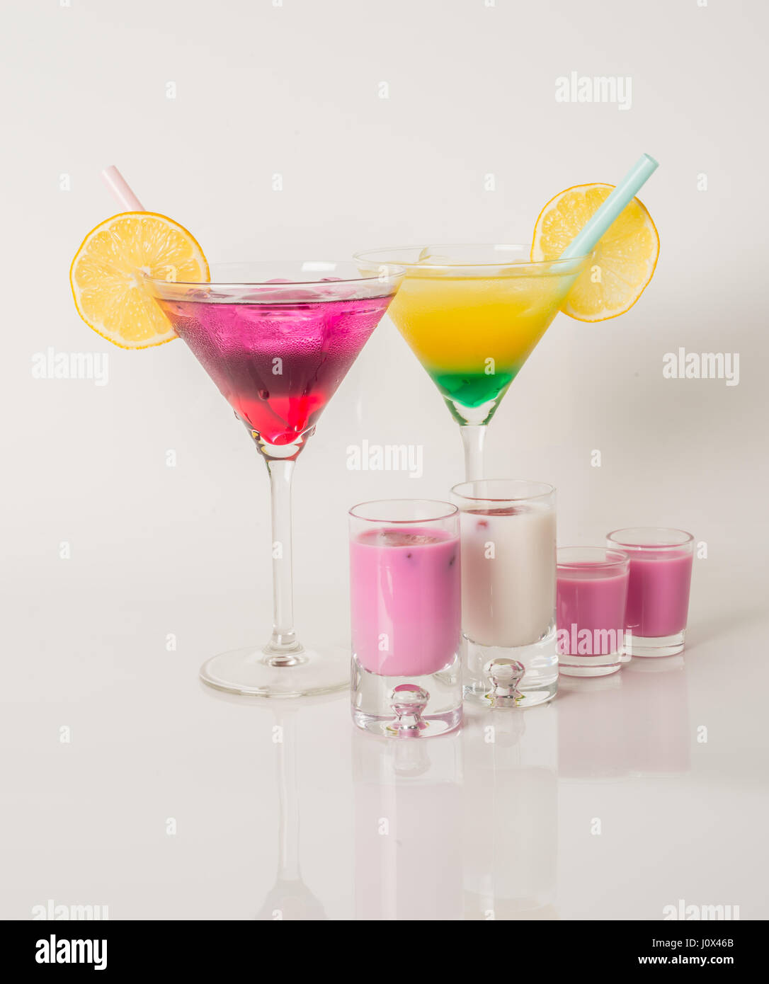 Colorful set of drinks, color drink decorated with fruit, color shots ...