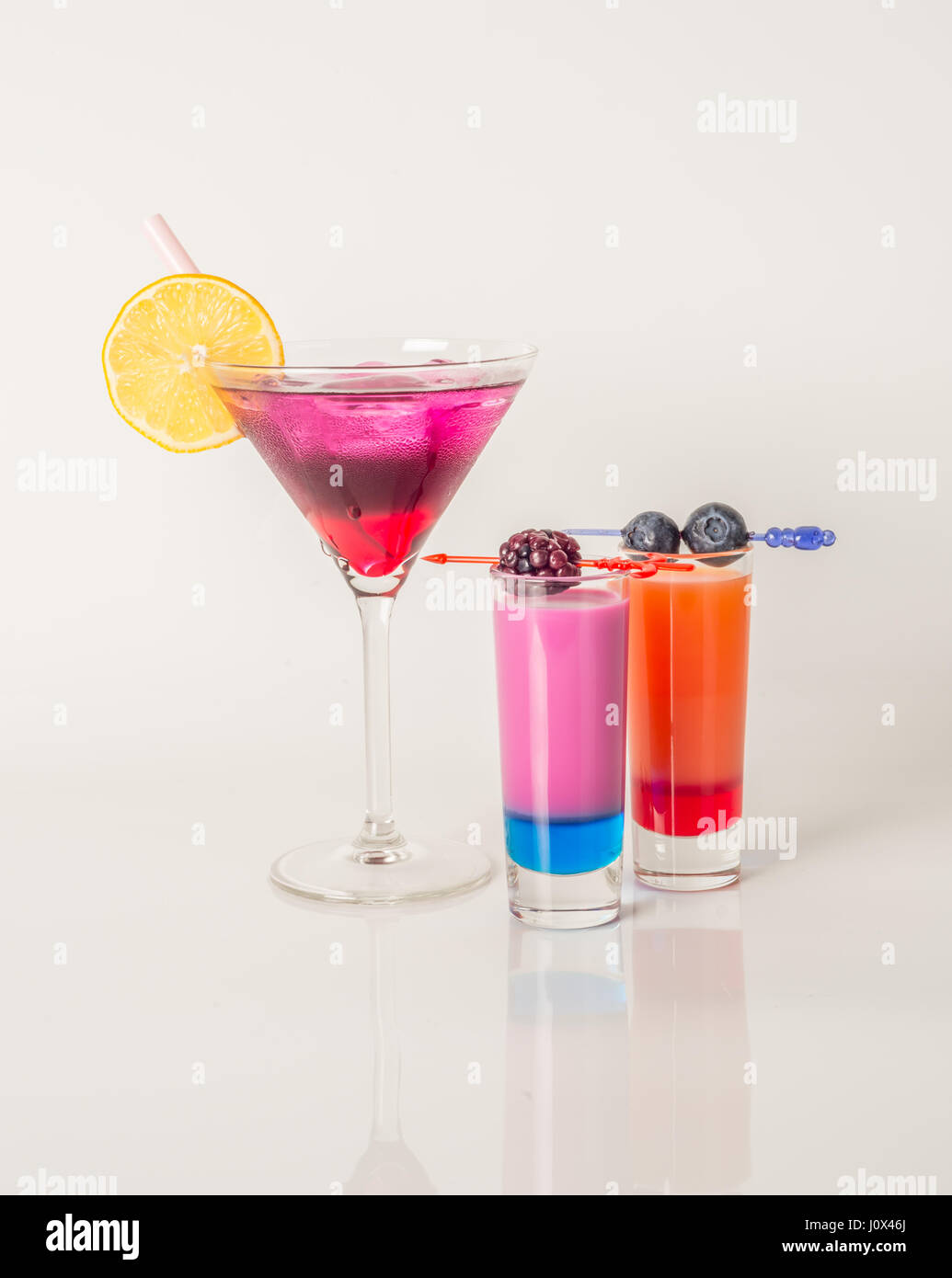 Colorful set of drinks, color drink decorated with fruit, color shots ...
