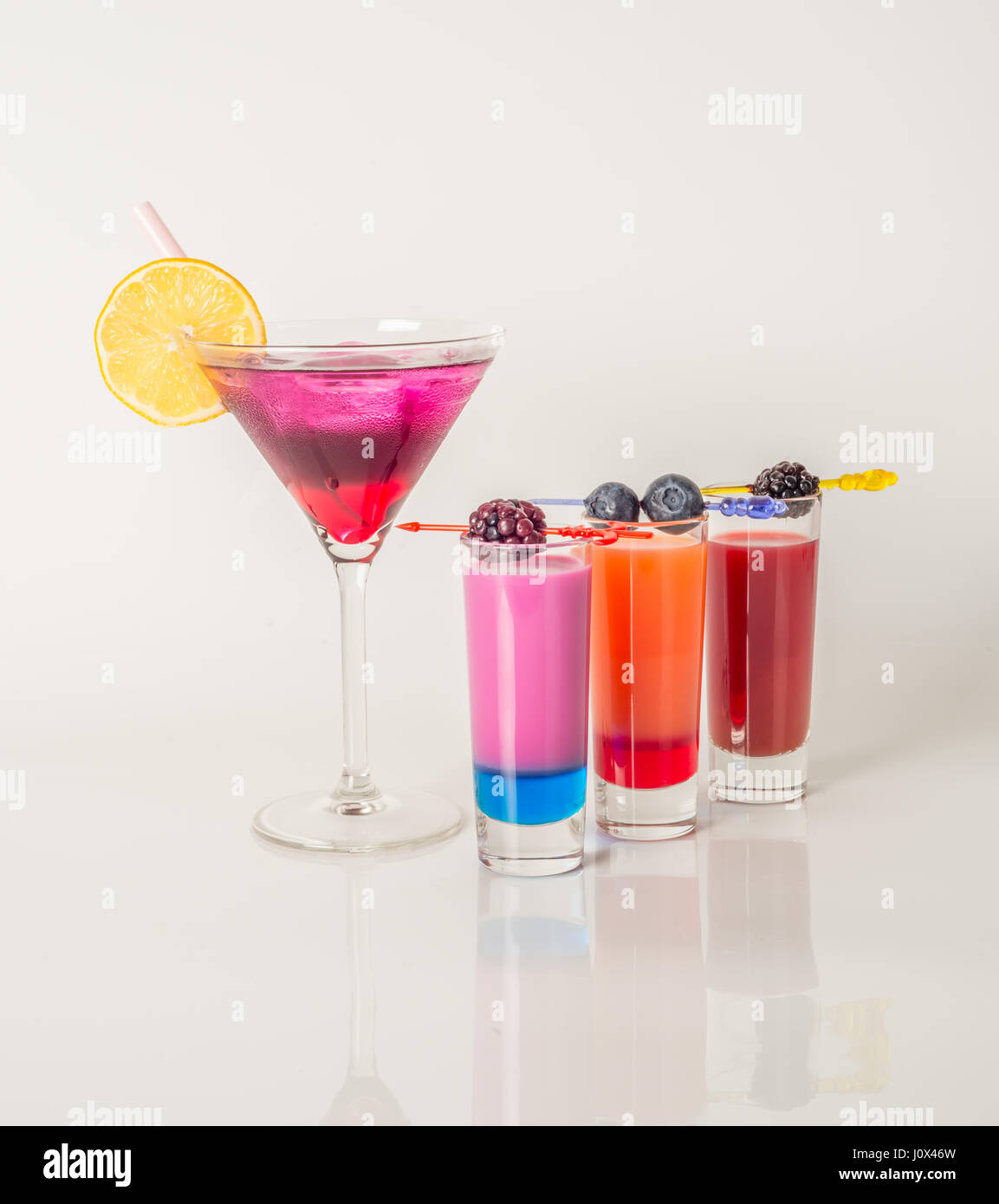 Colorful set of drinks, color drink decorated with fruit, color shots ...