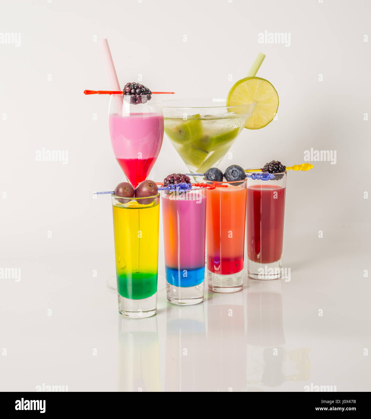 Colorful set of drinks, color drink decorated with fruit, color shots ...