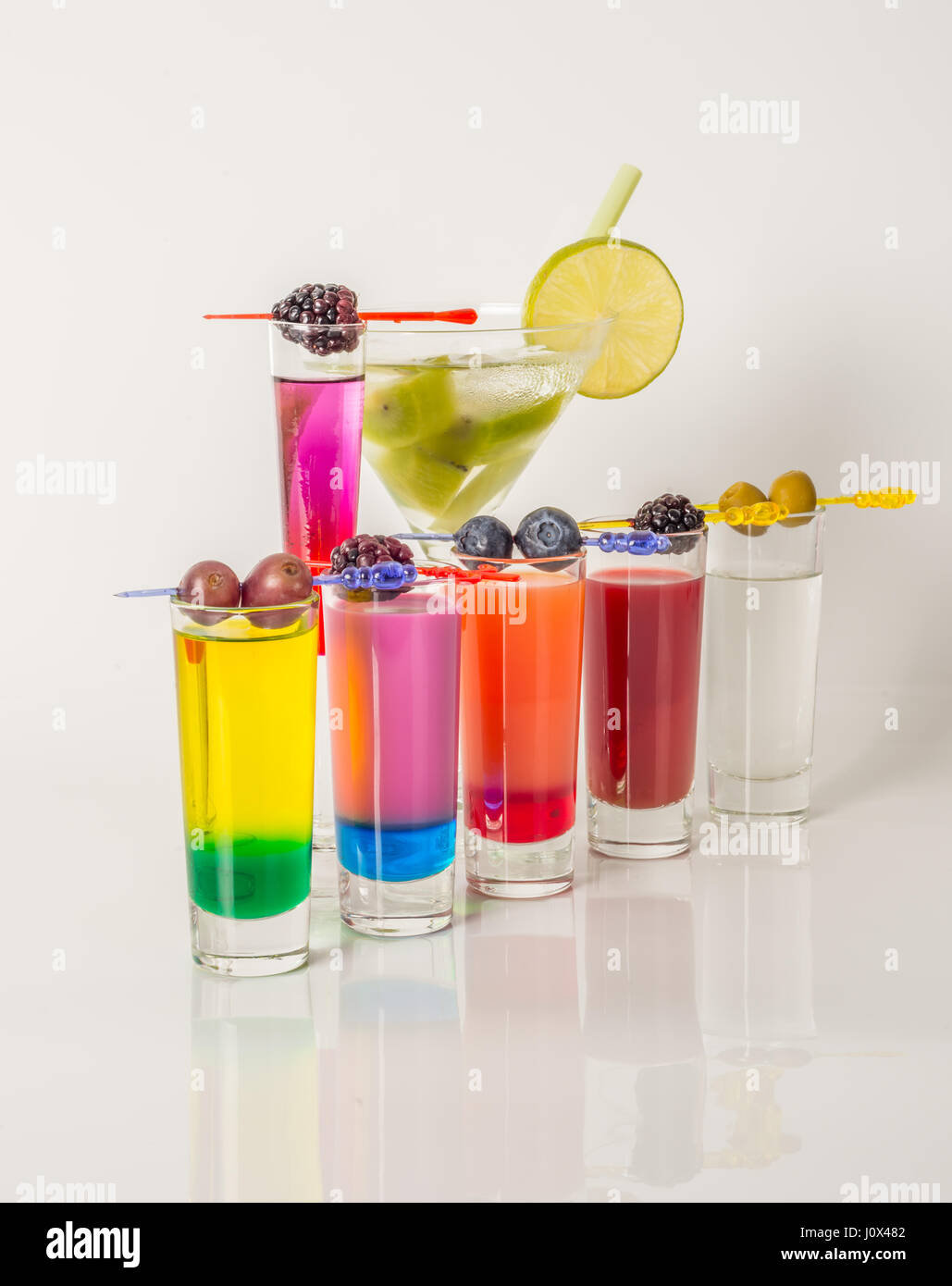 Colorful set of drinks, color drink decorated with fruit, color shots ...