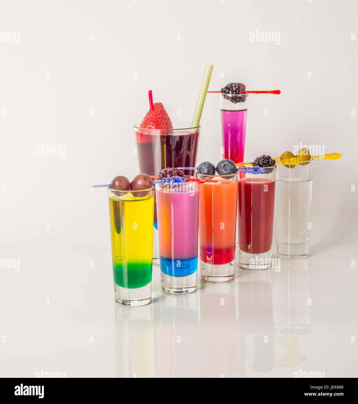 Colorful set of drinks, color drink decorated with fruit, color shots ...