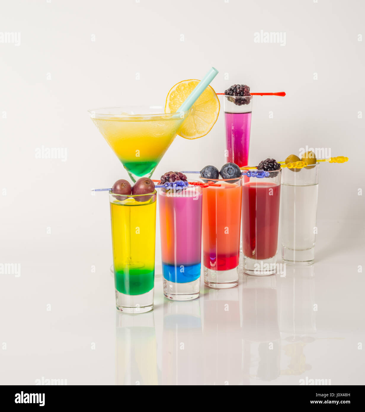 Colorful set of drinks, color drink decorated with fruit, color shots ...