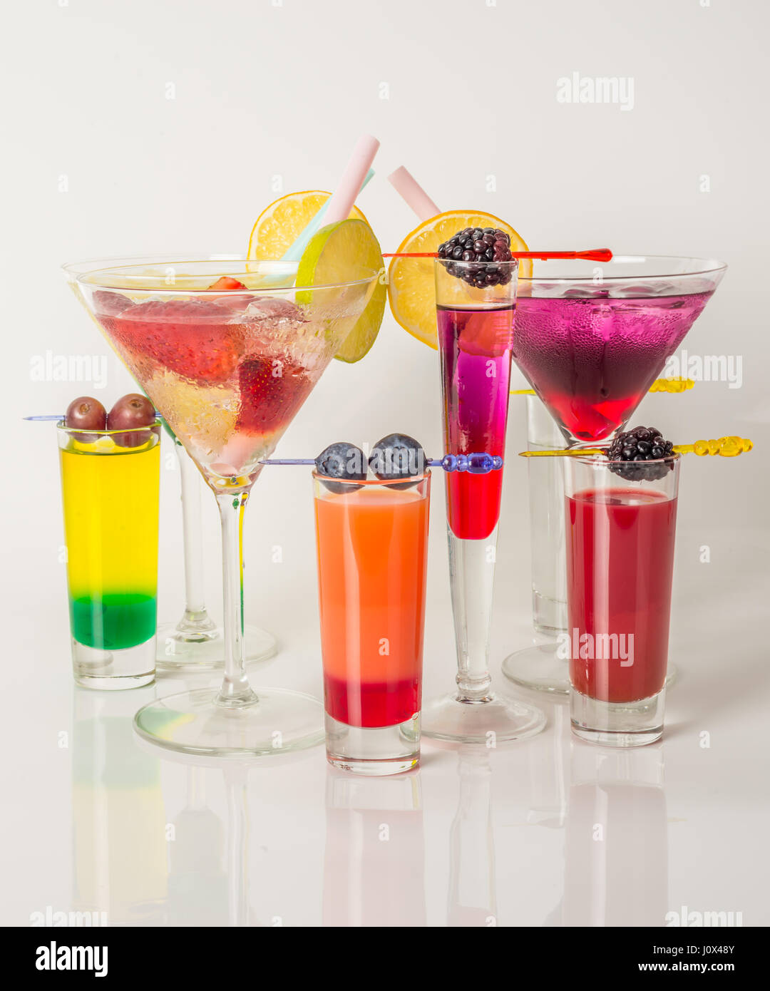 Colorful set of drinks, color drink decorated with fruit, color shots ...