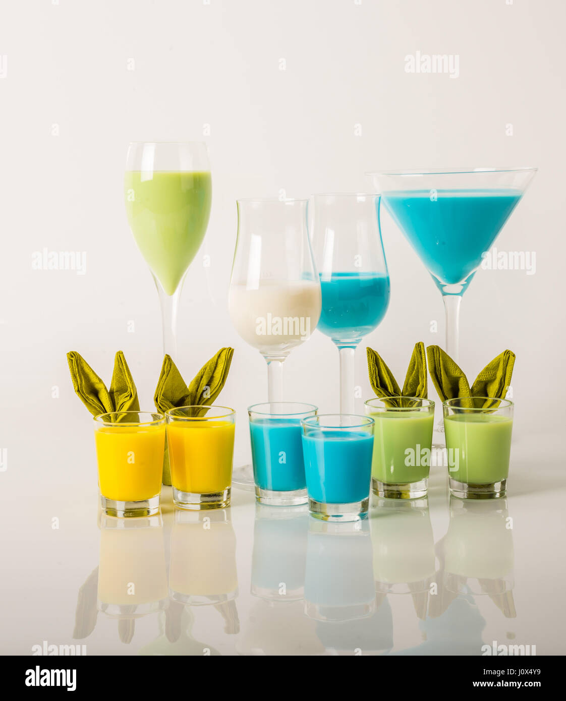 Colorful drinks based on milk liqueurs, unique pastel colors of drinks ...