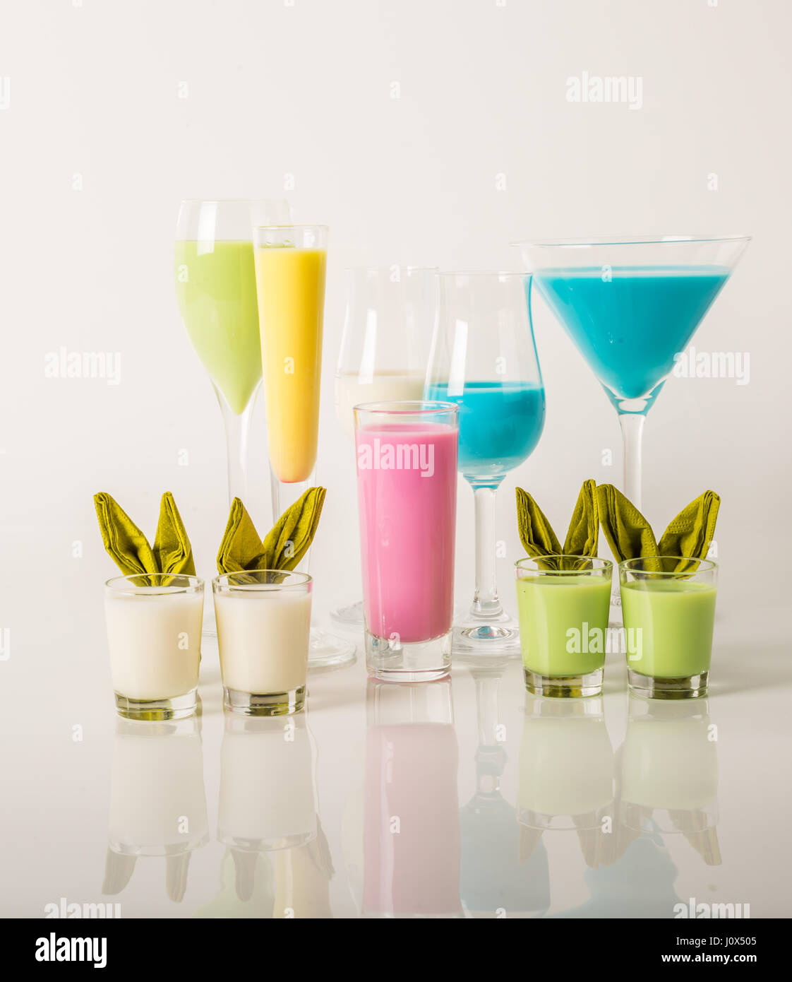 Colorful drinks based on milk liqueurs, unique pastel colors of drinks ...