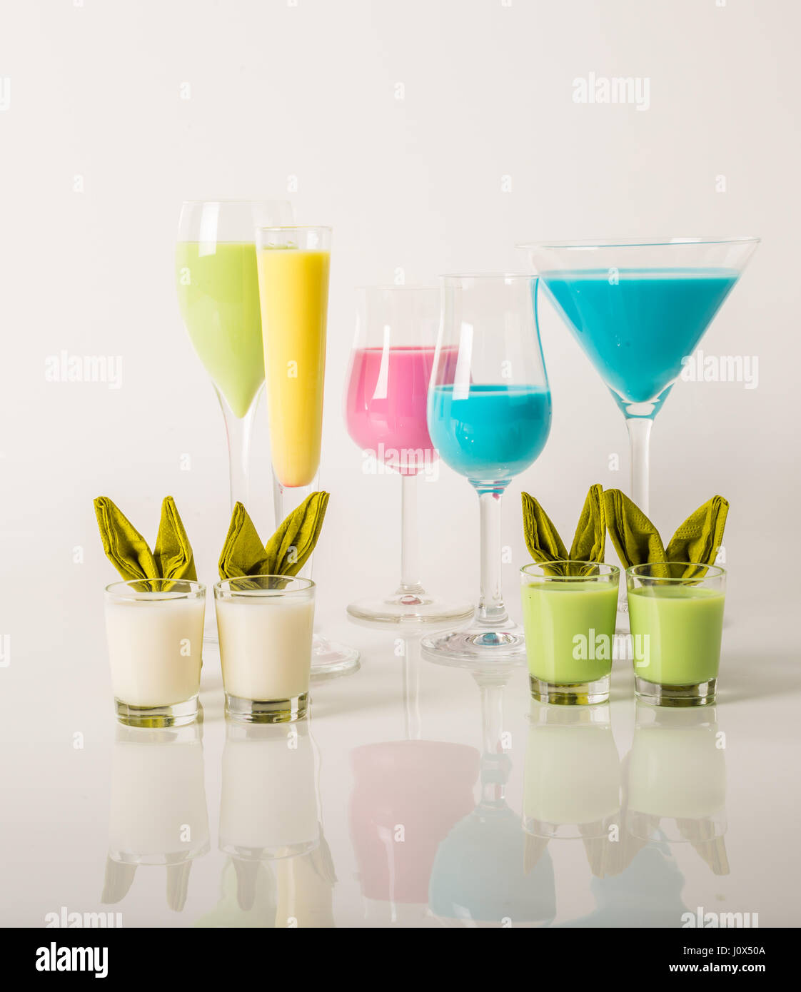 Colorful drinks based on milk liqueurs, unique pastel colors of drinks ...