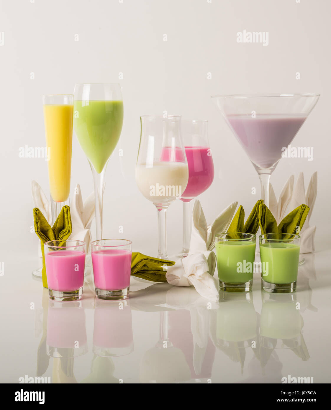 Colorful drinks based on milk liqueurs, unique pastel colors of drinks ...