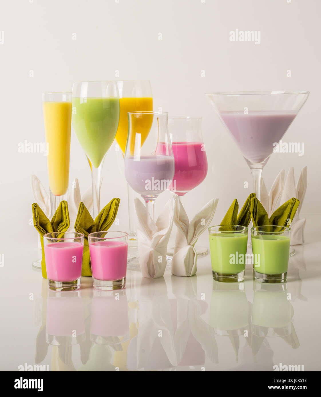 Colorful drinks based on milk liqueurs, unique pastel colors of drinks ...